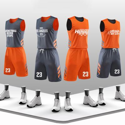 Cina La pallacanestro su due lati porta il jersey della pallacanestro degli uomini ha personalizzato l'uniforme del gruppo dello studente stampata progettazione del gioco di addestramento di logo del modello in vendita