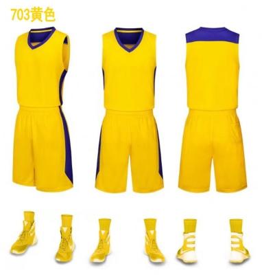 China El material de alta calidad al por mayor del poliéster uniforma la juventud de la Rápido-sequedad que el baloncesto uniforma el uniforme de encargo del baloncesto en venta