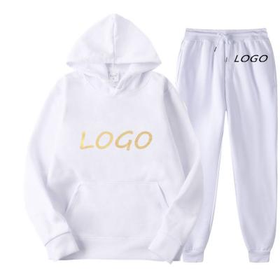 中国 注文のロゴの人の動揺のスーツ男女兼用のSweatsuitはフード付き女性トラックスーツを女性のために置かれて置いた 販売のため
