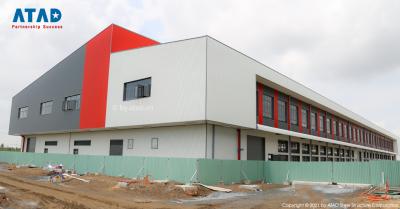 China A large precast steel structure office building with pitched roof and concrete foundation for sale
