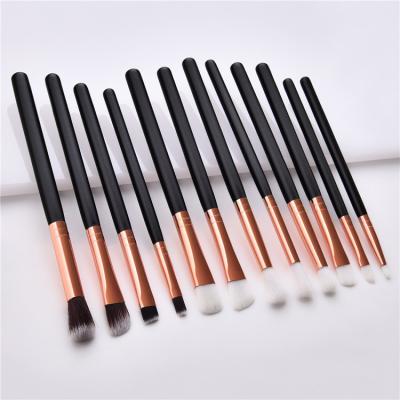 Cina Il nero di legno Rose Gold Pink del set di pennelli 12pcs di trucco dell'ombretto della maniglia in vendita