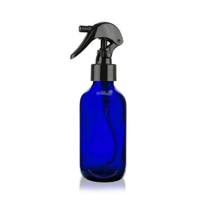 Cina 2 bottiglie rotonde della pompa di Boston del BLU di cobalto di Oz con il mini spruzzo di plastica nero di innesco in vendita