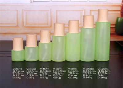 Cina bottiglia liquida dell'essenza 2oz con la bottiglia di vetro del contagoccia del coperchio di bambù per l'imballaggio cosmetico in vendita