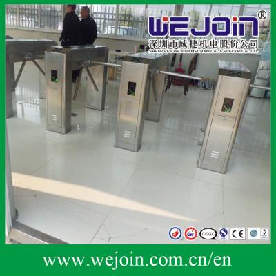 Cina Stainless Steel Housing Automatic Tripod Turnstile Gate With Traffice Light Indicator in vendita