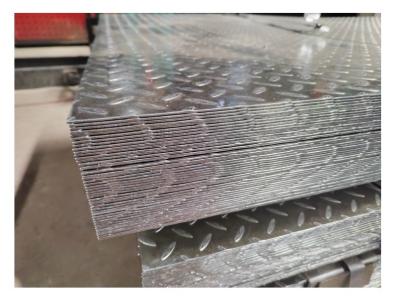 China Customizable 40g/m2 Zinc Layer Galvanized Pattern Steel Plate for Building Materials for sale