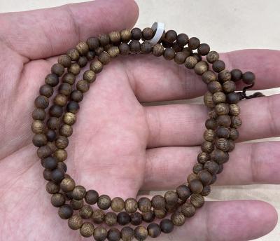 China Handcrafted 100% Natural Agarwood Beaded Bracelet with Adjustable Size and Distinct Fragrance for Meditation and Spiritual Wellness for sale