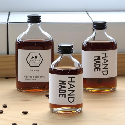 China Flat Flask Glass Bottle with Aluminum Cap for Cold Brew Coffee Juice Wine Liquor 50ml 100ml 200ml 250ml 350ml for sale