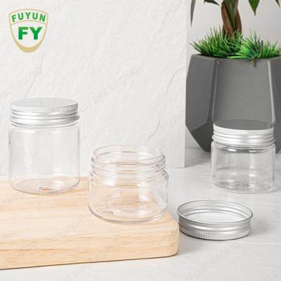 China frasco redondo plástico do ANIMAL DE ESTIMAÇÃO livre da cookie BPA de 550ml 600ml 1000ml com tampa à venda