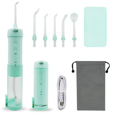 Cina Prezzo di fabbrica Irrigatore orale Acqua elettrica dentale Flosser Pulizia dei denti 2 in 1 Spazzolino elettrico con acqua Flosser in vendita