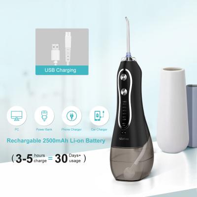China 2500mAh Battery Water Flosser 5 nozzles Portable Rechargeable Teeth Whitening Electric Oral Irrigator for sale
