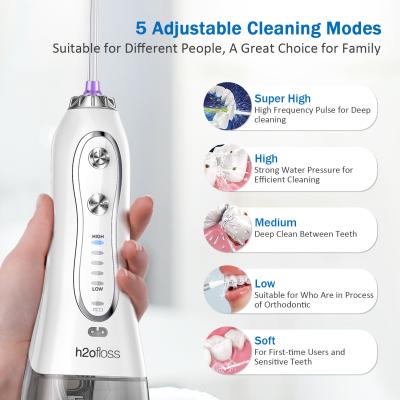 China Flosser eléctrico de agua recargable USB de 300 ml para blanquear y eliminar manchas dentales en venta
