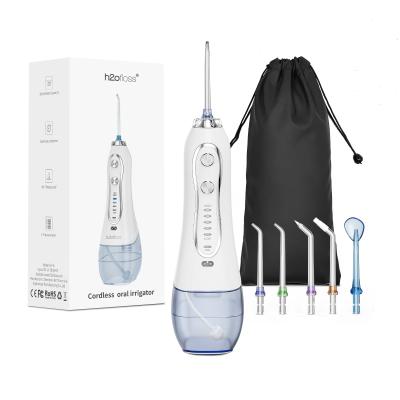 China Portable Cordless Water Flosser with 300ml Tank and IPX7 Waterproof Design for Powerful Teeth Cleaning for sale