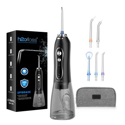 China Advanced Portable Dental Water Flosser Rechargeable USB Power Household Oral Care Cleaning Irrigator IPX7 Cordless Handle for sale