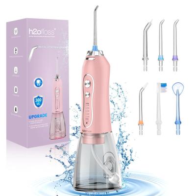 China Cordless Dental Teeth Irrigator Portable Water Flosser Rechargeable Ipx7 Waterproof Mini Oral Irrigator for sale