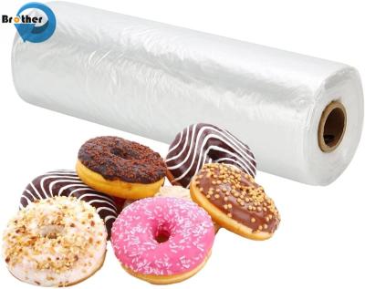 China Printed Clear Virgin Material Plastic Food Grade Plastic LDPE Bread Packaging Bags with Ties on Roll for sale