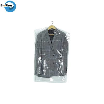 China Disposable Garment Cover Bag Clear Standard Dry Cleaner Bag on Roll Printed with Safety Warning Word for sale