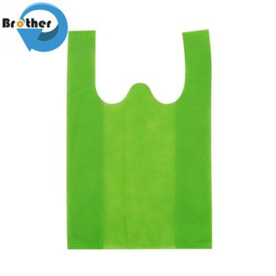 Cina Cheap Eco-Friendly Reusable W Cut T Shirt Vest PP Non Woven Supermarket Tote Grocery Shopping Carry Gift Bag for Sale in vendita
