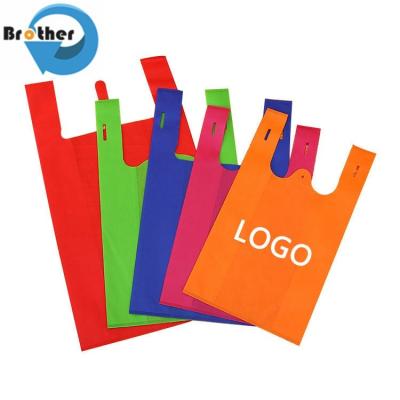 Cina Biodegradable Cheap Eco-Friendly Reusable W Cut T Shirt Vest PP Non Woven Supermarket Tote Grocery in vendita