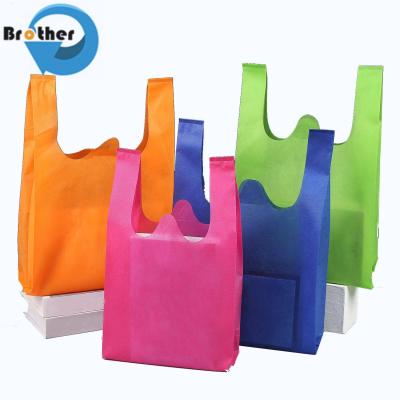 Cina Colorful T-Shirt Bag PP Nonwoven Bag Shopping Bags W-Cut Bag in vendita