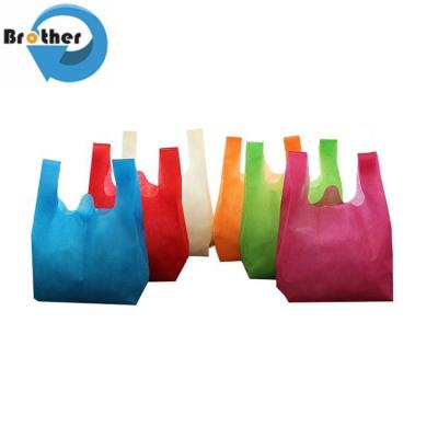 China Multicolor Customized D W U Cut Foldable Reusable Non Woven T-Shirt Bag for Shopping Packing for sale
