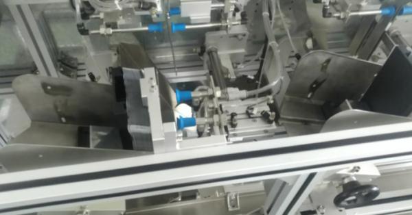 1.2KW Facial Mask Cutting Folding Packing Machine 0.6MPA Automatic Nonwoven