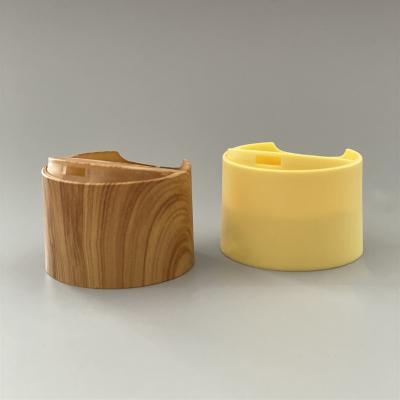 China Monsters US 0.06/Piece 24/410 Houten schijfkap, schijftopkap, perskap voor shampoofles Te koop