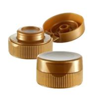 China Customized Request Plastic Honey Cap Flip Top Cap 28410 with Silicone for sale