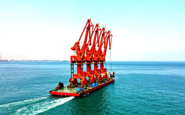 A5-A8 Gantry Port Crane in operation at a shipping terminal handling containers