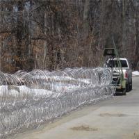 China Hot Dipped Galvanized Concertina Razor Wire Coils BTO-22 450mm for sale