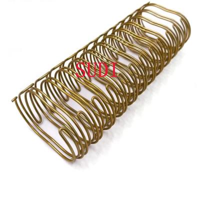 China Emperramento 44.45mm dobro dourado do fio O 3/4 de polegada para livros de texto dos cadernos do folheto à venda