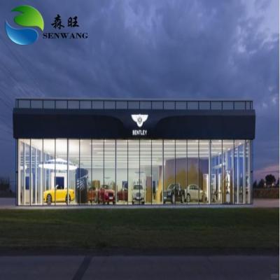 Cina Salone espositivo di auto prefabbricate e magazzino struttura in acciaio di fascia alta con porta scorrevole / rotante in vendita