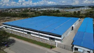 Китай Требования заказчика: Стальное складское здание с конструкцией раздвижной двери продается