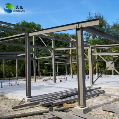 China Prefabricated Steel Structure Warehouse with 1.2m Brick Wall and C&Z Purlin Brace for Low Maintenance Costs for sale
