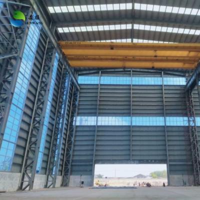 China Corrosion Resistant Steel Structure Warehouse with 0.35kn/m2 Wind Load and Concrete Foundation for sale