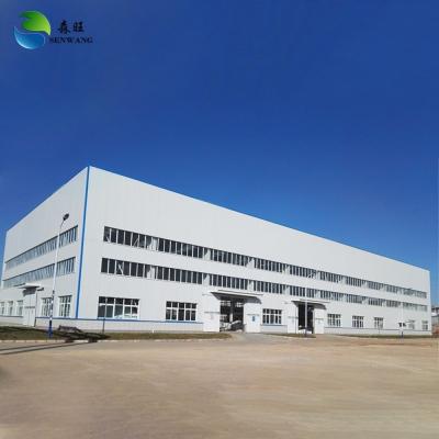 China Wind Resistance Up To 300 Km/h Steel Structure Warehouse With 50 Years Service Life And Sandwich Panel Heat Insulation for sale
