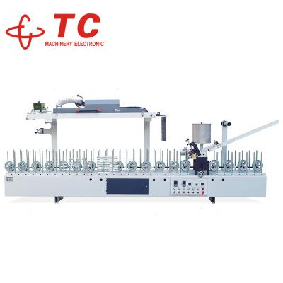 China TC Other Woodworking Machinery  Woodveneer Frame Aluminum Strip EVA Hot Glue Profile Wrapping Machine for sale