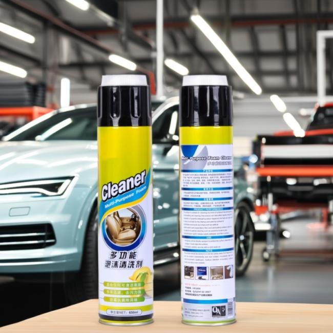 Foam spray cleaner in use on car seats