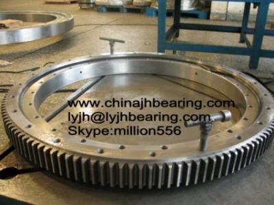 China 061.25.1120.301.11.1523 four point contact ball slewing bearing with external gear ,1013X1278X79mm for sale