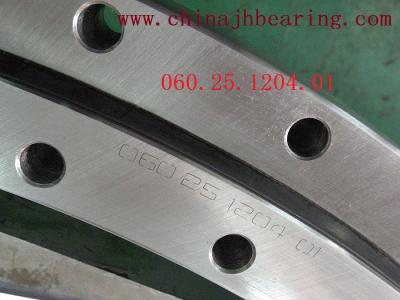 China RKS.060.25.1204 four point contact slewing bearing 1289x1119x68 mm belongs to medium size without a gear for sale