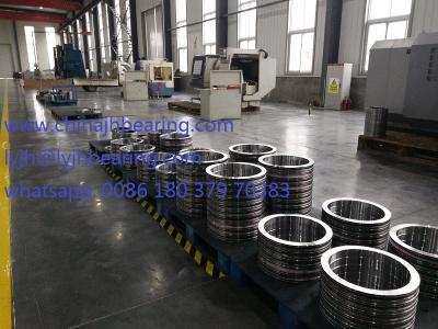 China RKS.060.25.1204  China factory four point contact ball slewing bearing,1119x1289x68mm, without gear,JBT10471 standard for sale