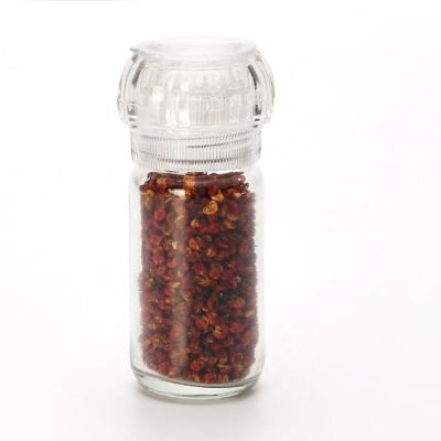 China 80ml Spices condiments Custom design private logo ceramic core cylindrical transparent glass grinding bottle for sale