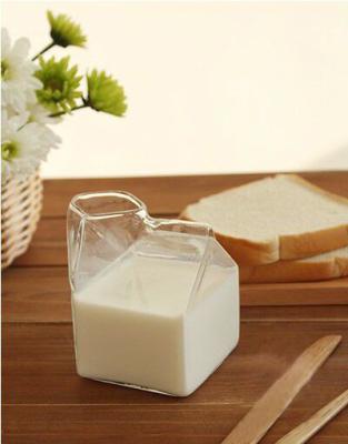 China new arrival milk bottle special square juice bottle unique shape juice glass cup for sale