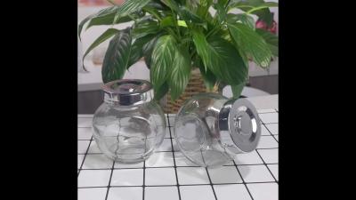 China flat drum transparent storage wholesale candy grains sealed glass bottles and jars for sale