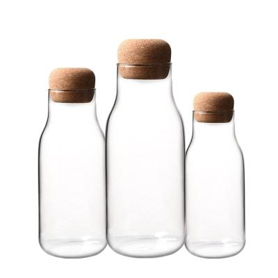 China affordable Transparent glass sealed can Creative cork container sealed jar for sale