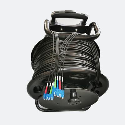 China Tactical Armored Field Fiber Optic Cable with Portable Cable Reel, 2/4/6/8/12 Core LC SC Waterproof Connector, TPU Jacket Stainless Steel Spiral Armored Field Deployable Optical Cable for sale
