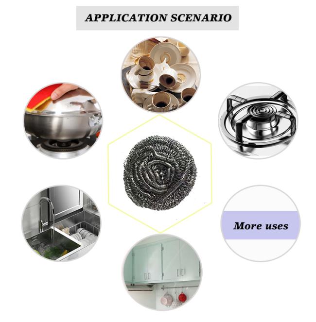 Stainless steel cleaning ball held in hand showing size and flexibility
