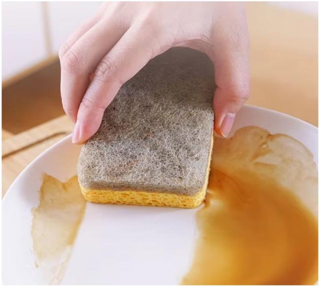 Cellulose sponges in use for cleaning