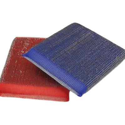 Close-up of stainless steel cleaning pad texture