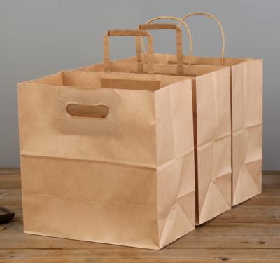 China Commercial Recycled  Brown Paper Goodie Bags With Twisted Handles for sale
