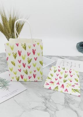 China Recyclable Kraft Paper Packaging Bags Luxury Style Customized Your Own Logo for sale